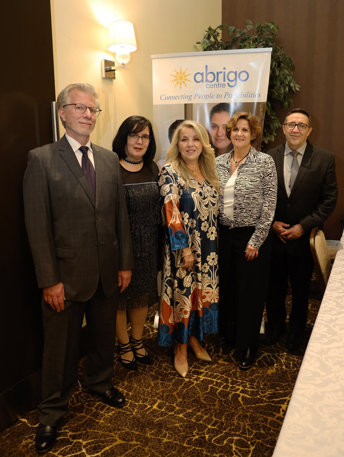 Abrigo’s Fundraising Dinner Inspires Guests to New Heights